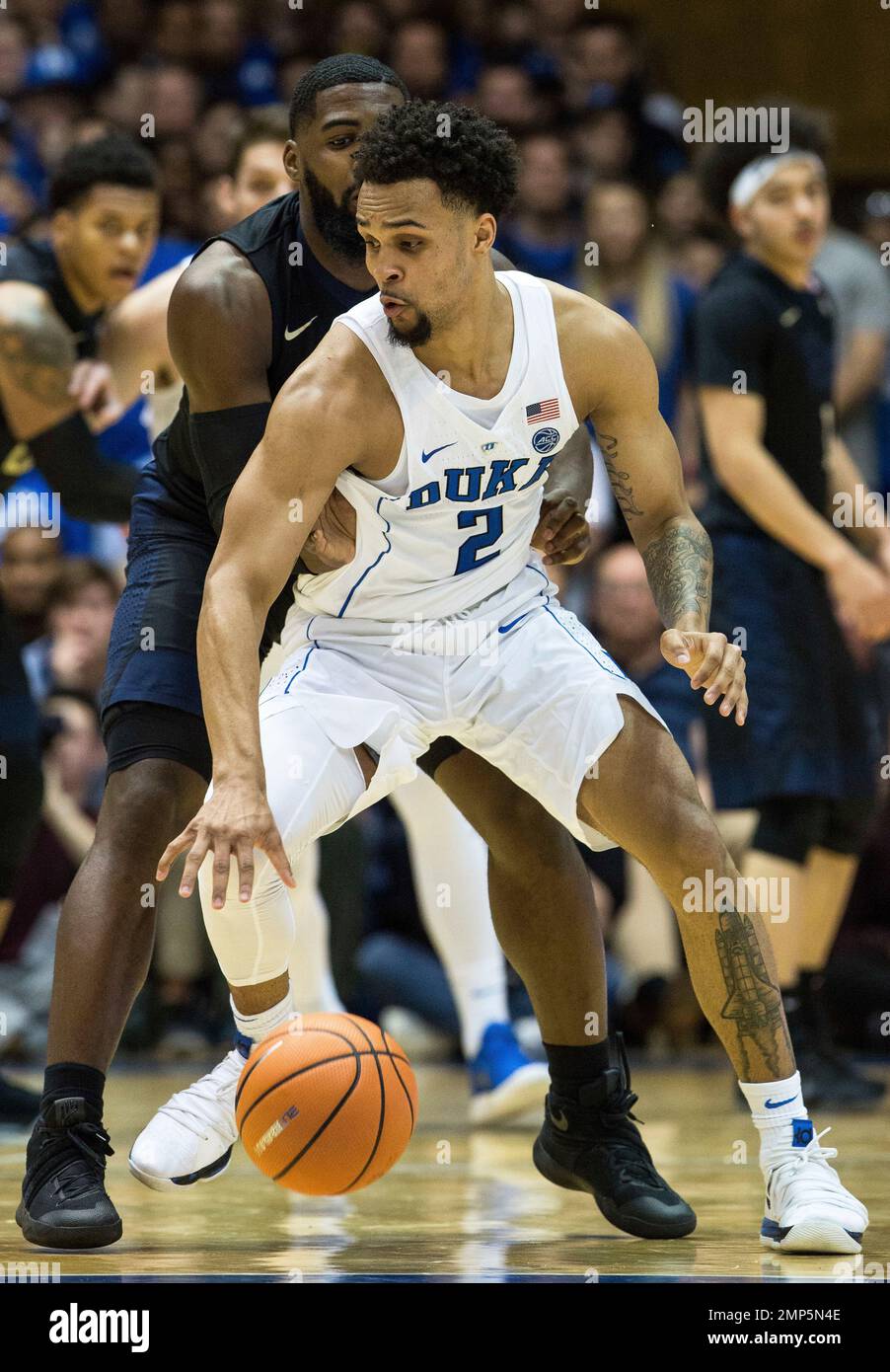 Duke's Gary Trent, Jr. (2) handles the ball as Pittsburgh's Jared ...
