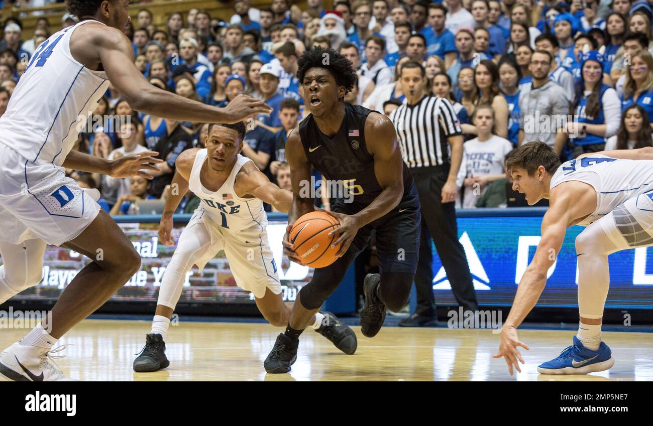 Pittsburgh's Marcus Carr (5) drives against Duke's Wendall Carter, Jr ...