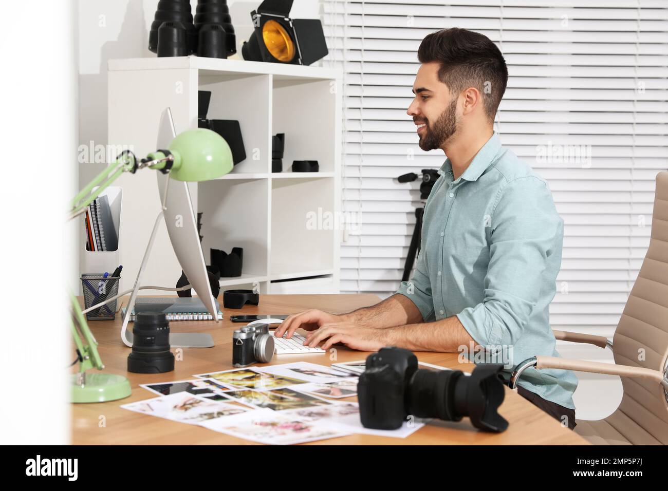 Professional photographer working hi-res stock photography and images ...