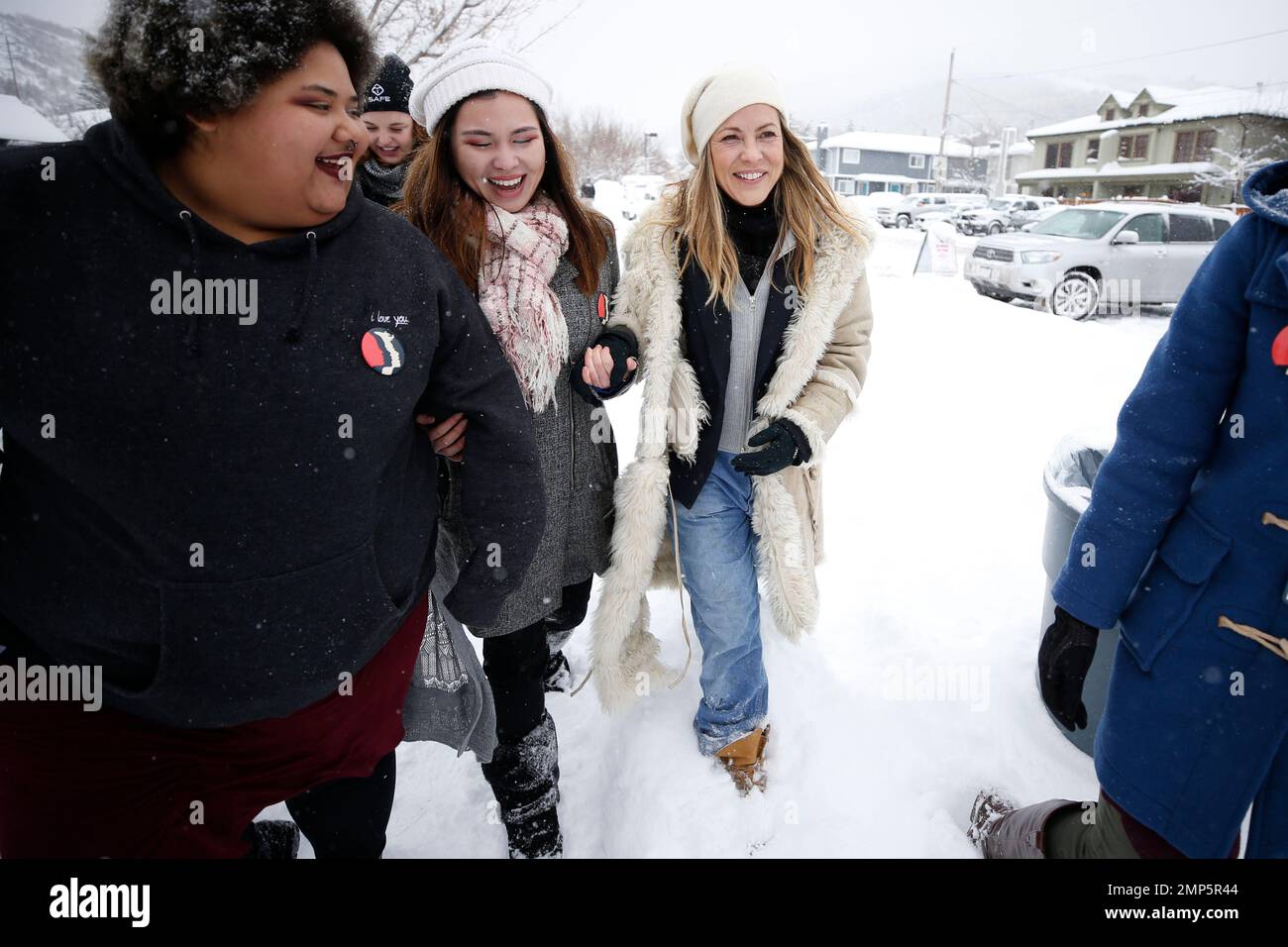 Actress Maria Bello, right, reacts with local actresses Tenisha Nicole ...
