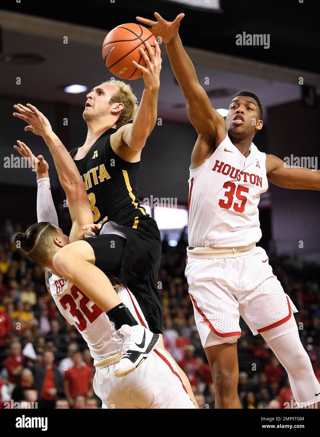 Wichita State guard Conner Frankamp, center, runs into Houston guard ...