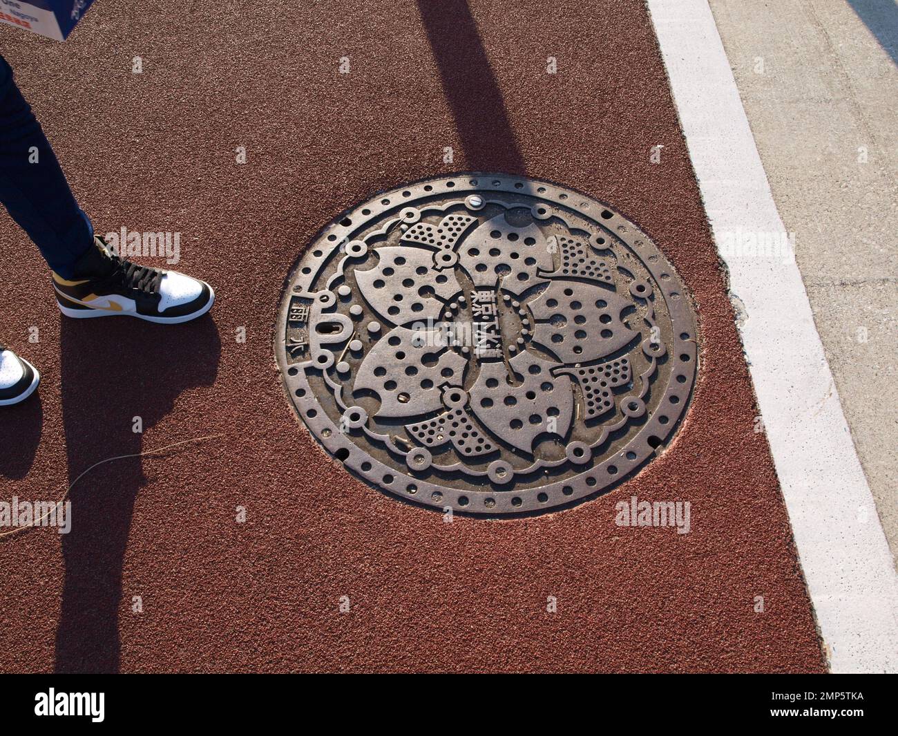 Pothole in Japan Stock Photo - Alamy