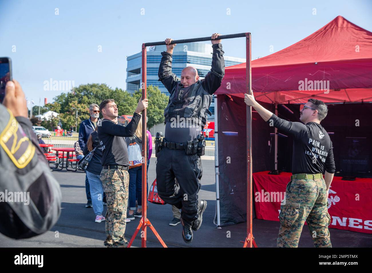 A North Carolina State Highway Patrol trooper attempts the pull up bar ...