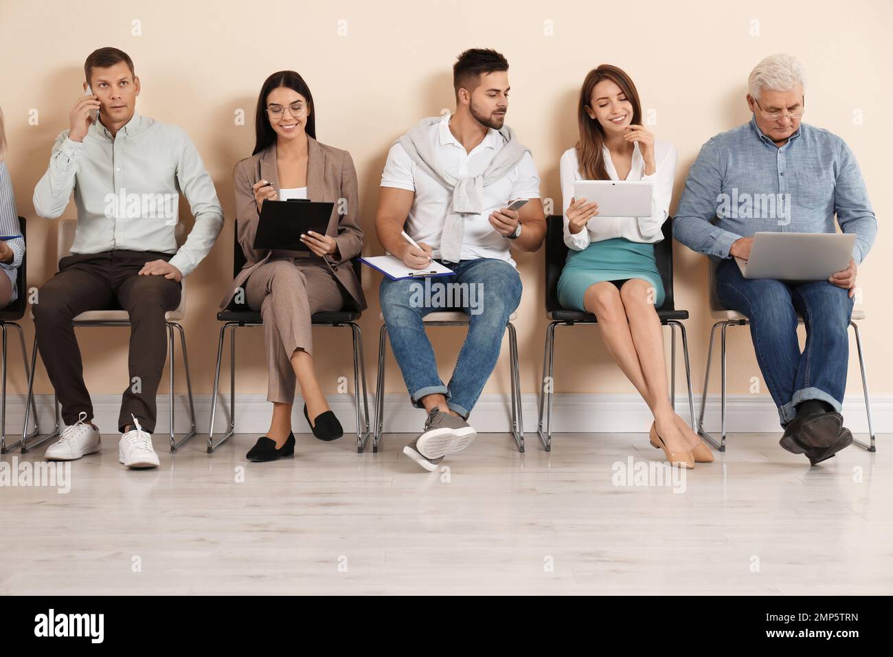 People waiting for job interview in office Stock Photo - Alamy