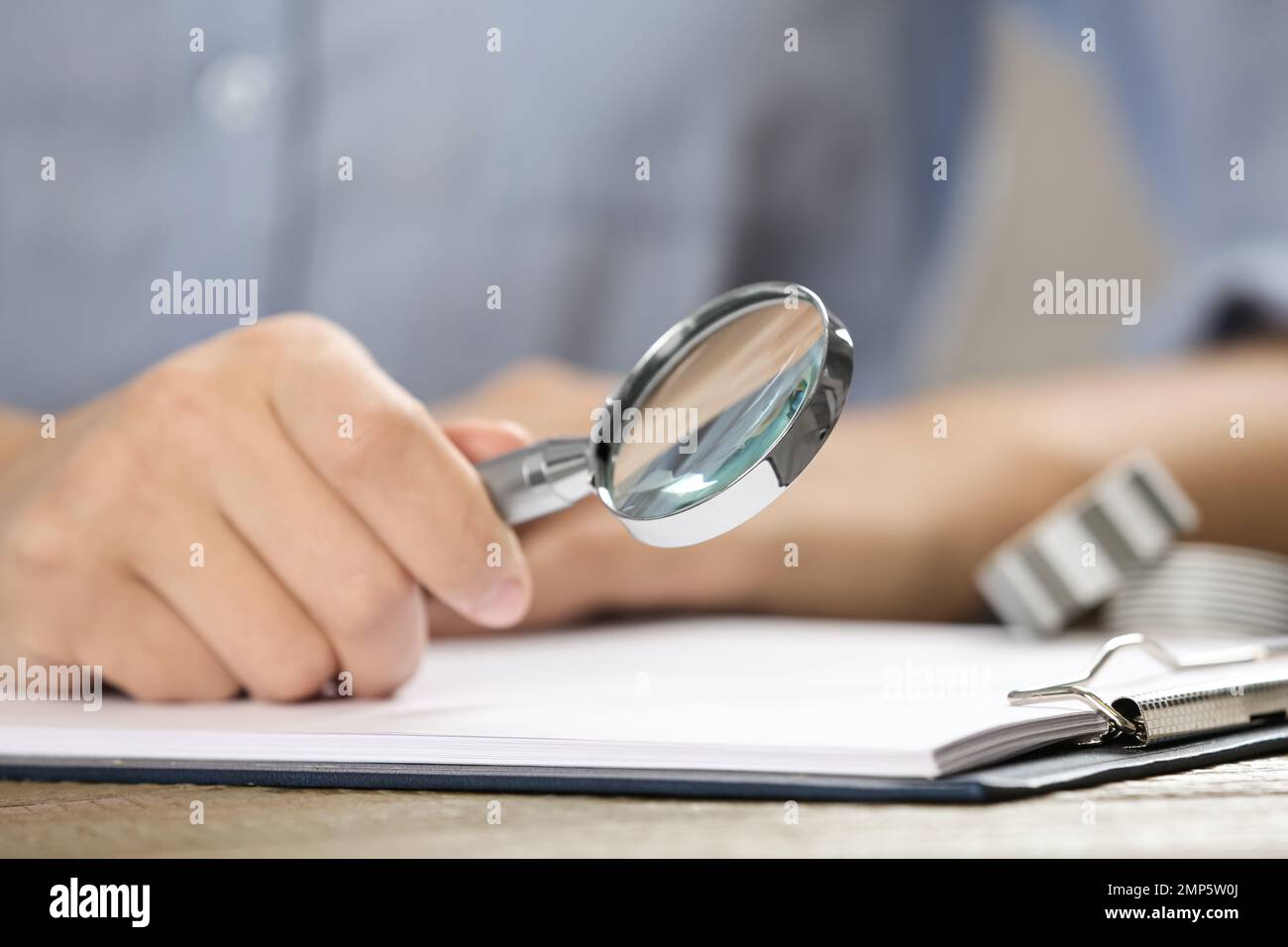 Accountant using magnifying glass hi-res stock photography and images ...