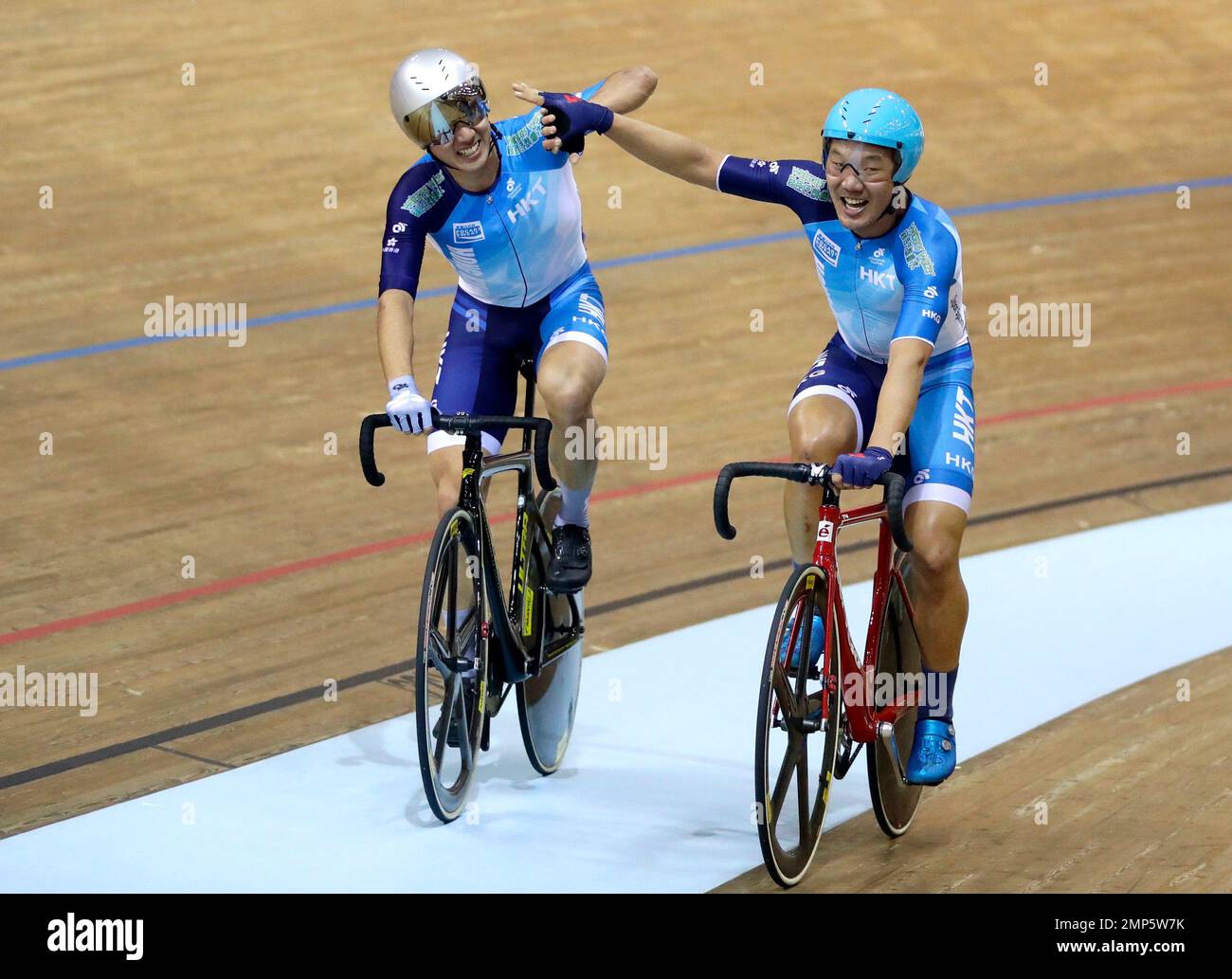 Chun Wing Leung and King Lok Cheung, of Hong Kong, celebrate their ...