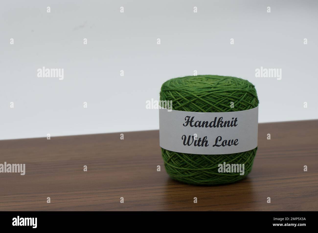 Skein of yarn with the message of Handmade With Love Stock Photo - Alamy