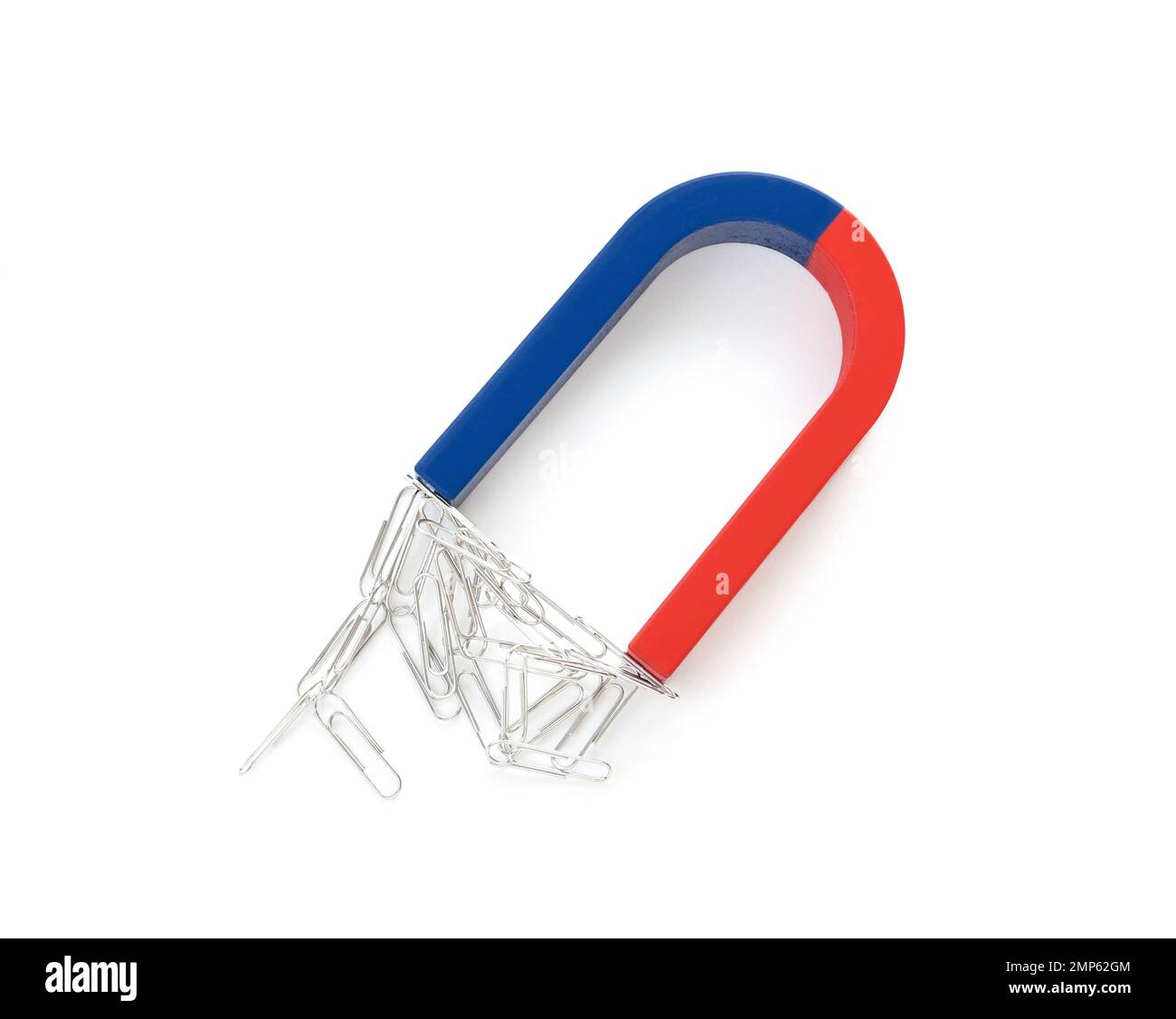 Magnet attracting paper clips on white background, top view Stock Photo ...