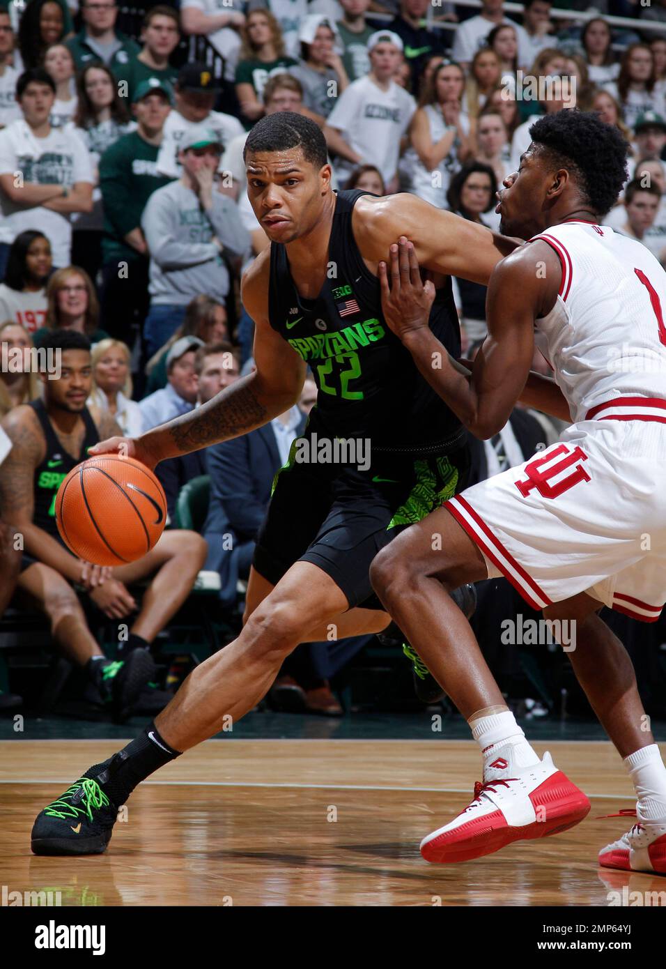 Michigan State's Miles Bridges, left, drives against Indiana's Aljami ...