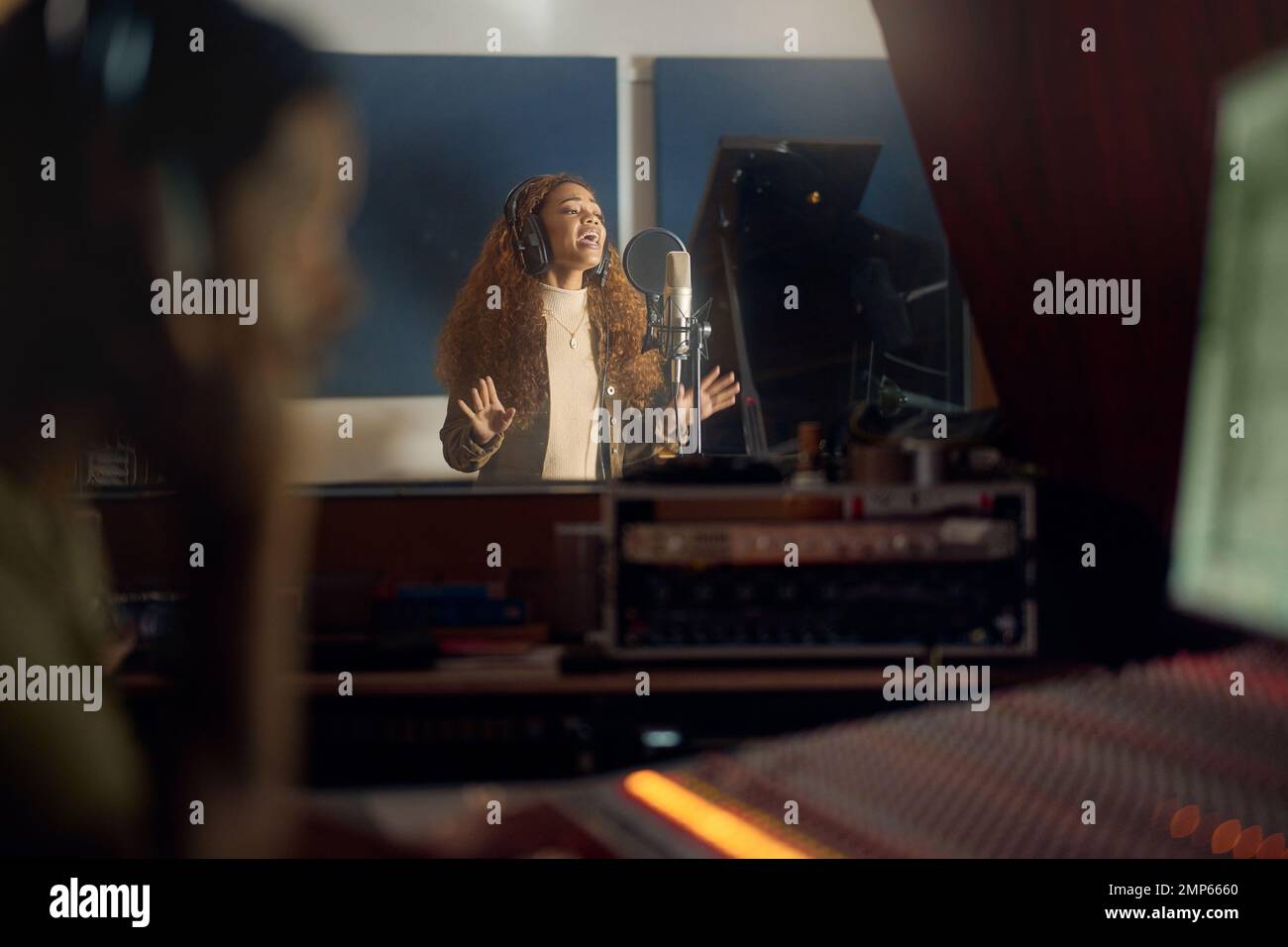 Female musician recording song hi-res stock photography and images - Alamy