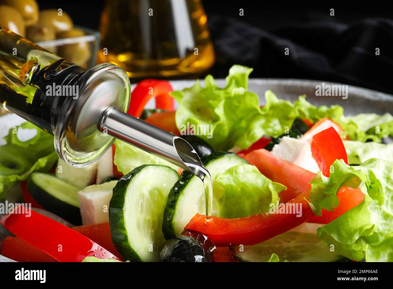 Adding salad dressing hi-res stock photography and images - Alamy