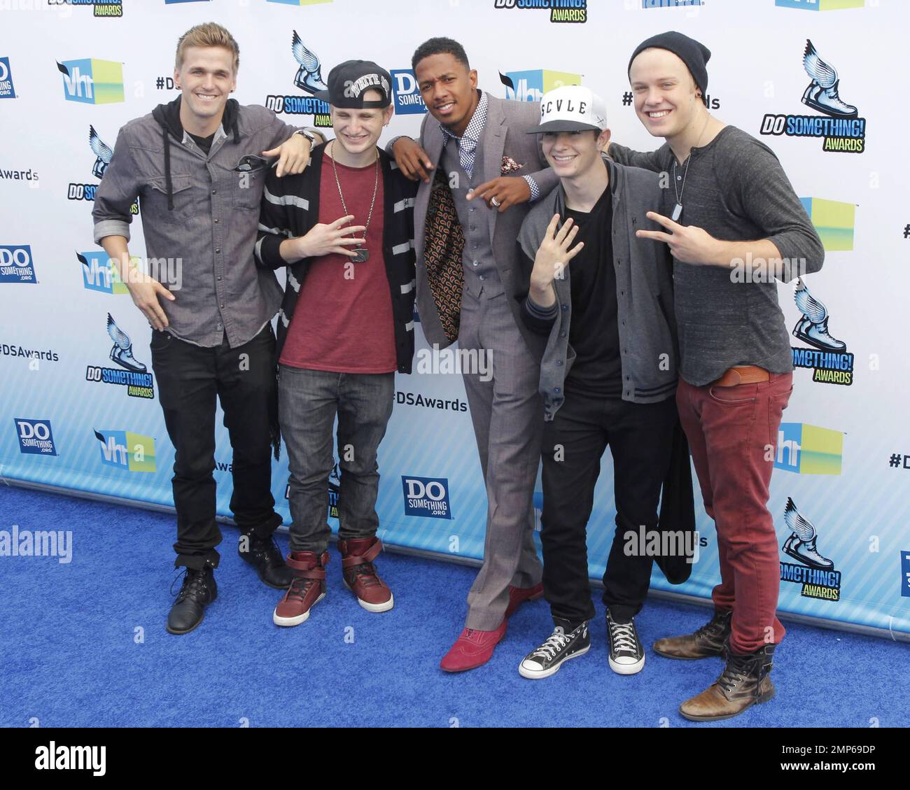 Nick Cannon with (L-R) Aaron Scott, Adam Ackerman, Kieran Ackerman, and ...
