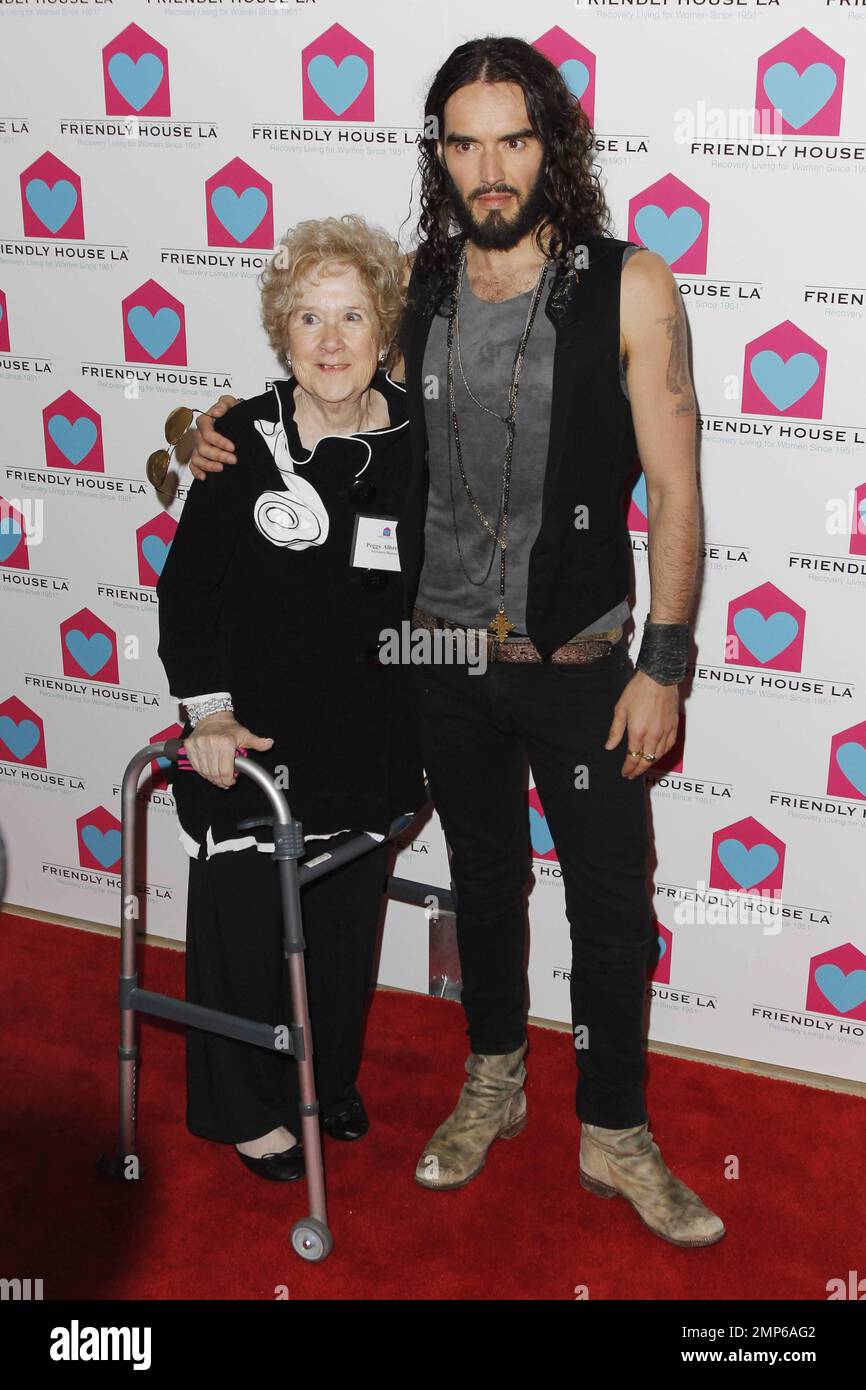 Peggy Albrecht and Russell Brand at the Friendly House LA Annual Awards ...