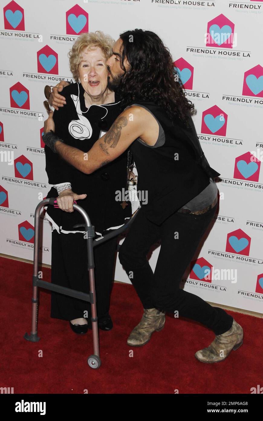 Peggy Albrecht and Russell Brand at the Friendly House LA Annual Awards ...