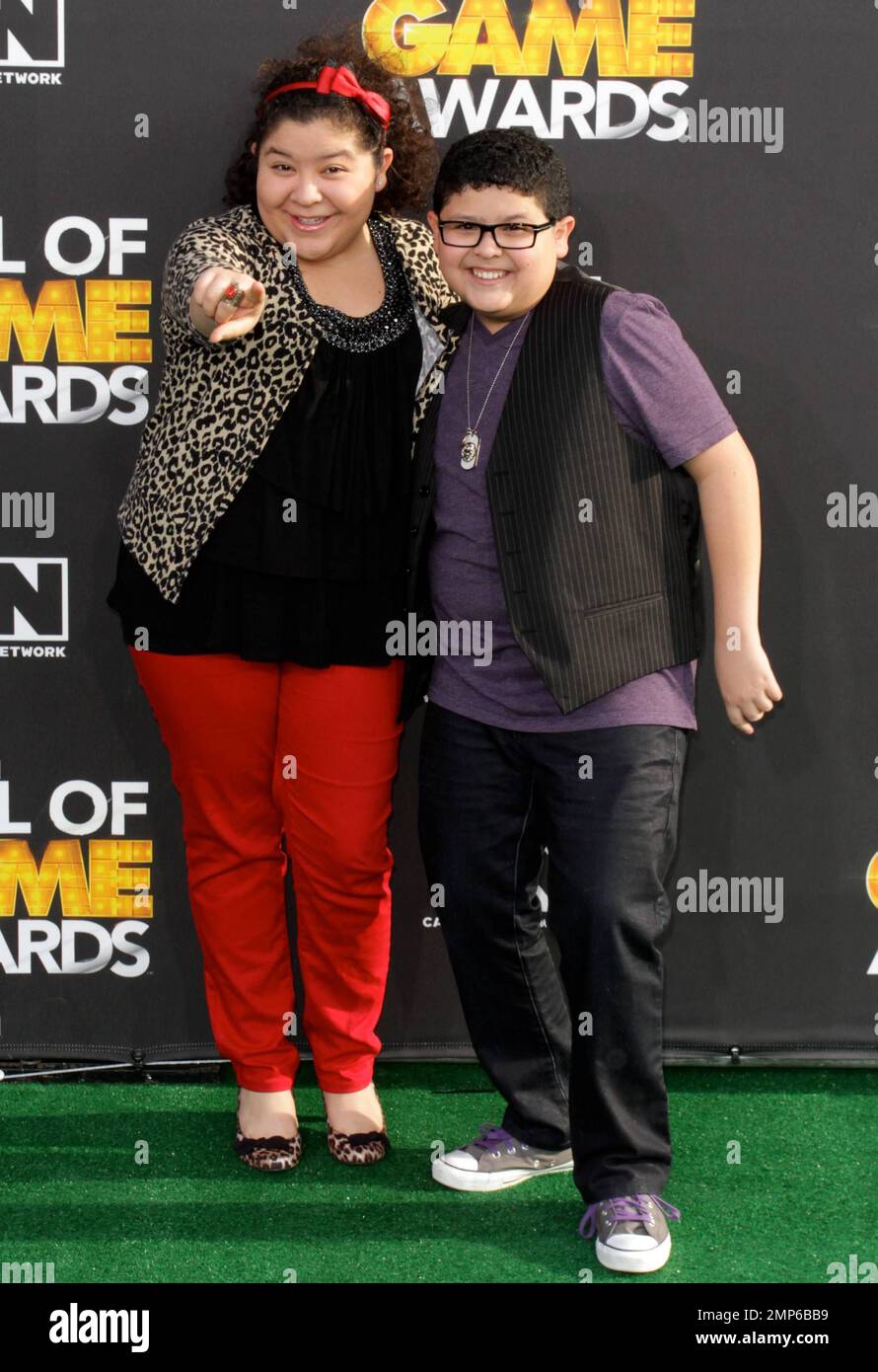 Rico Rodriguez (R) with sister Raini Rodriguez arriving at the Cartoon ...