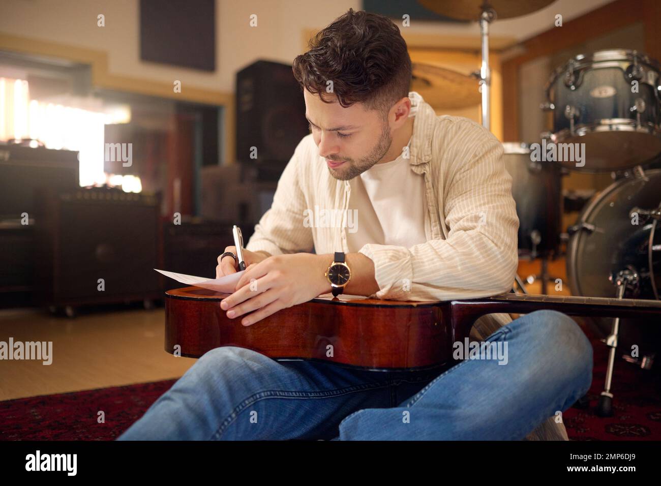 Idea, artist and musician writing a song for a performance, sound and ...