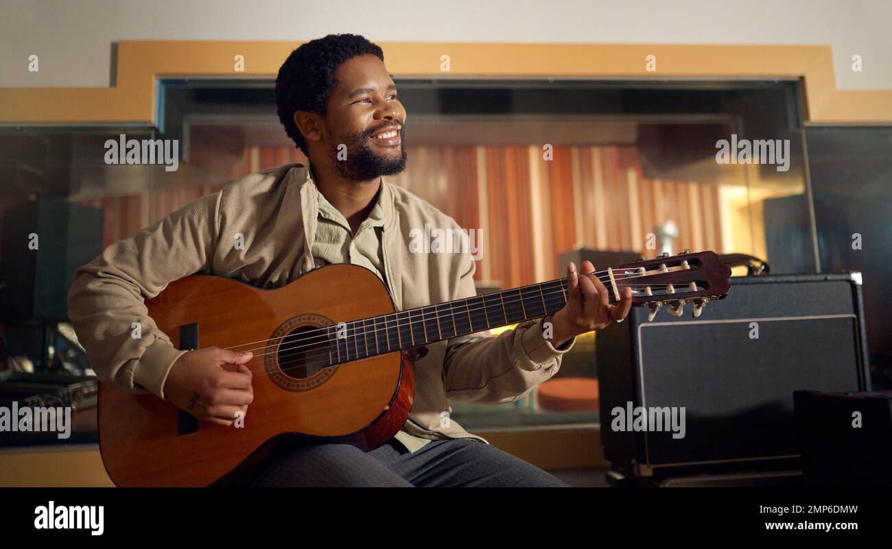 Musician, acoustic and man playing the guitar for music production or ...