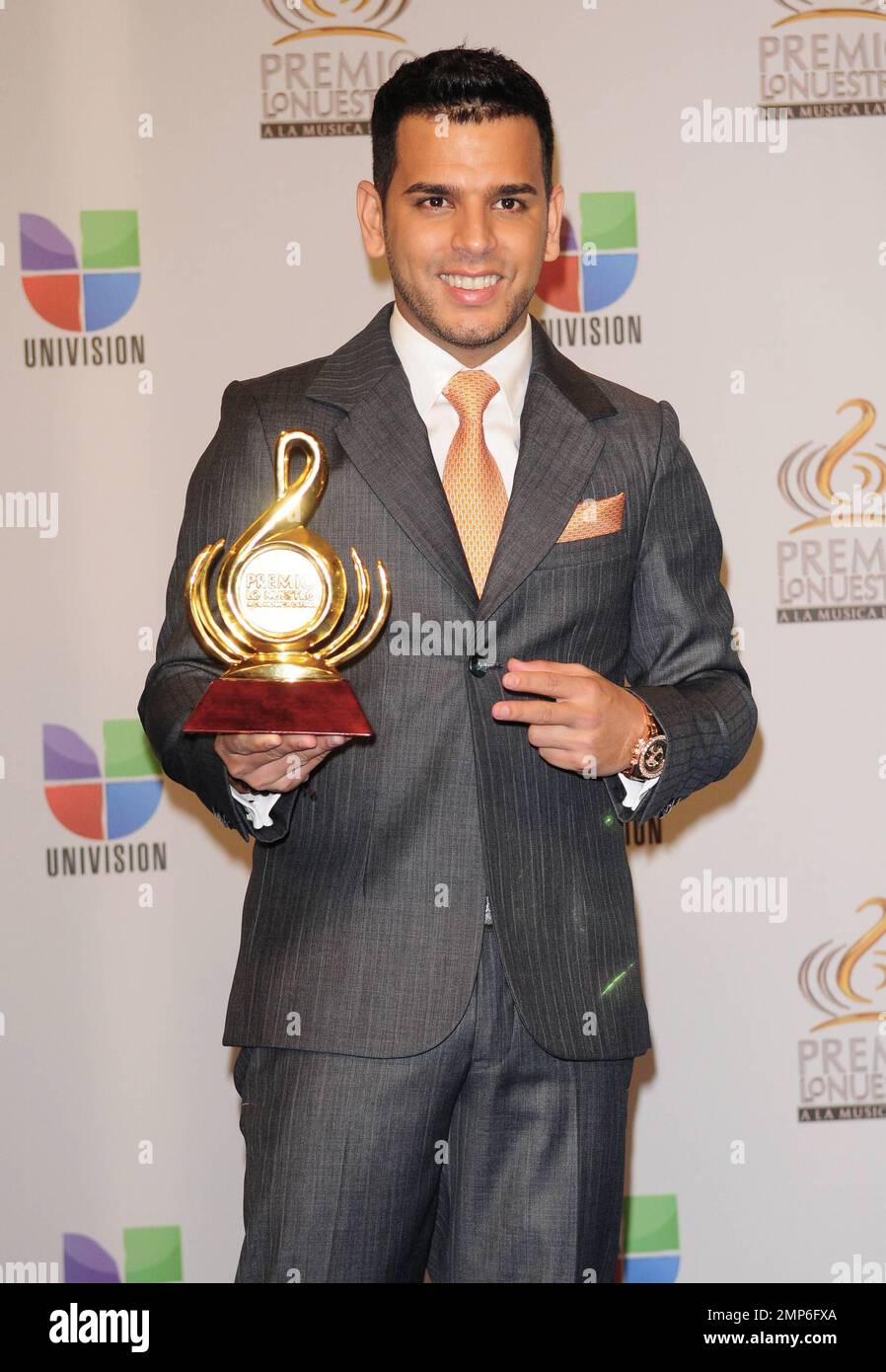 Tito el Bambino poses backstage at Univision's 2012 Premio Lo Nuestro a ...
