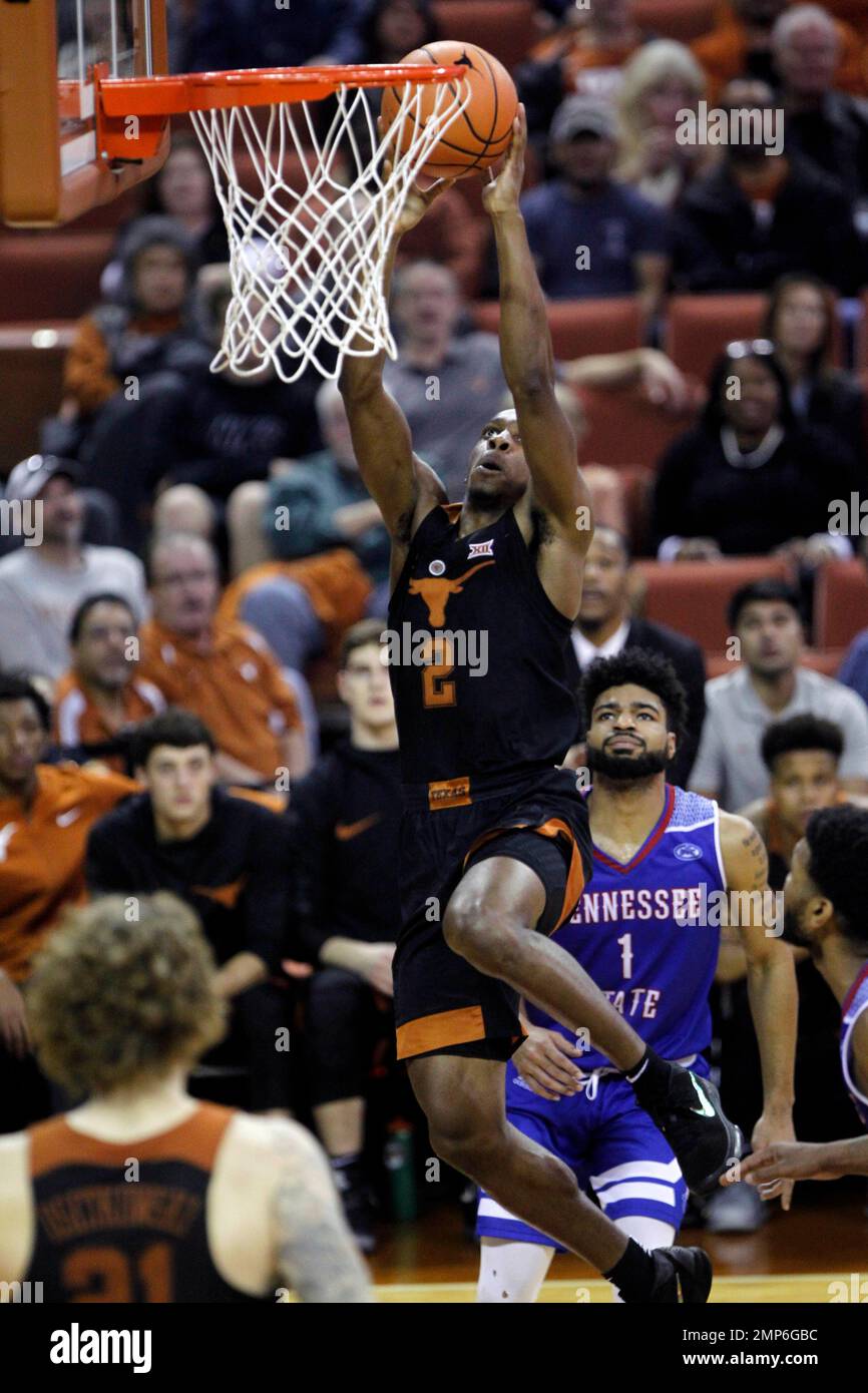 Texas guard Matt Coleman (2) goes up for a shot during the second half ...