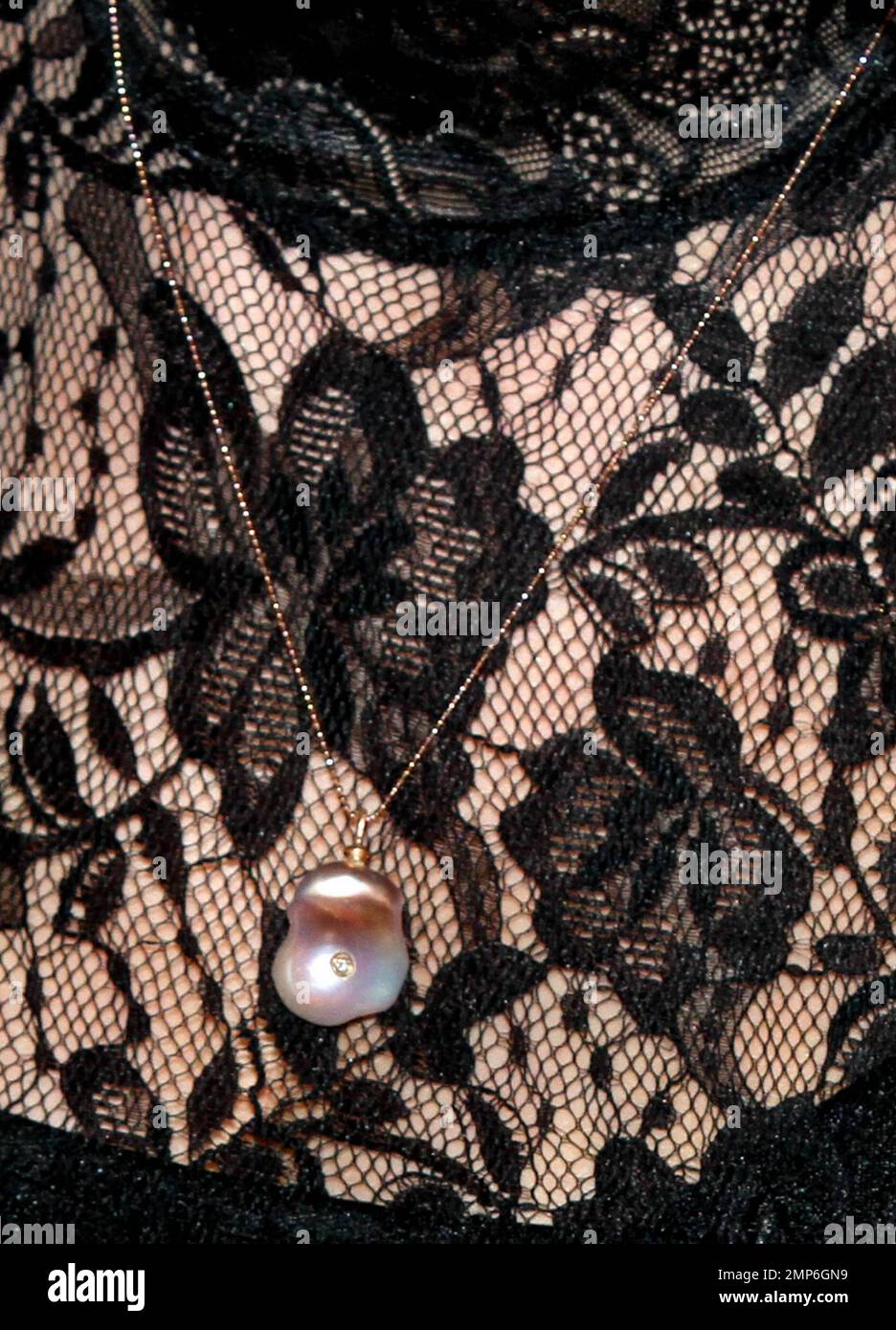 Lisa Stelly (jewelry detail) arriving at the 19th annual Race To Erase ...