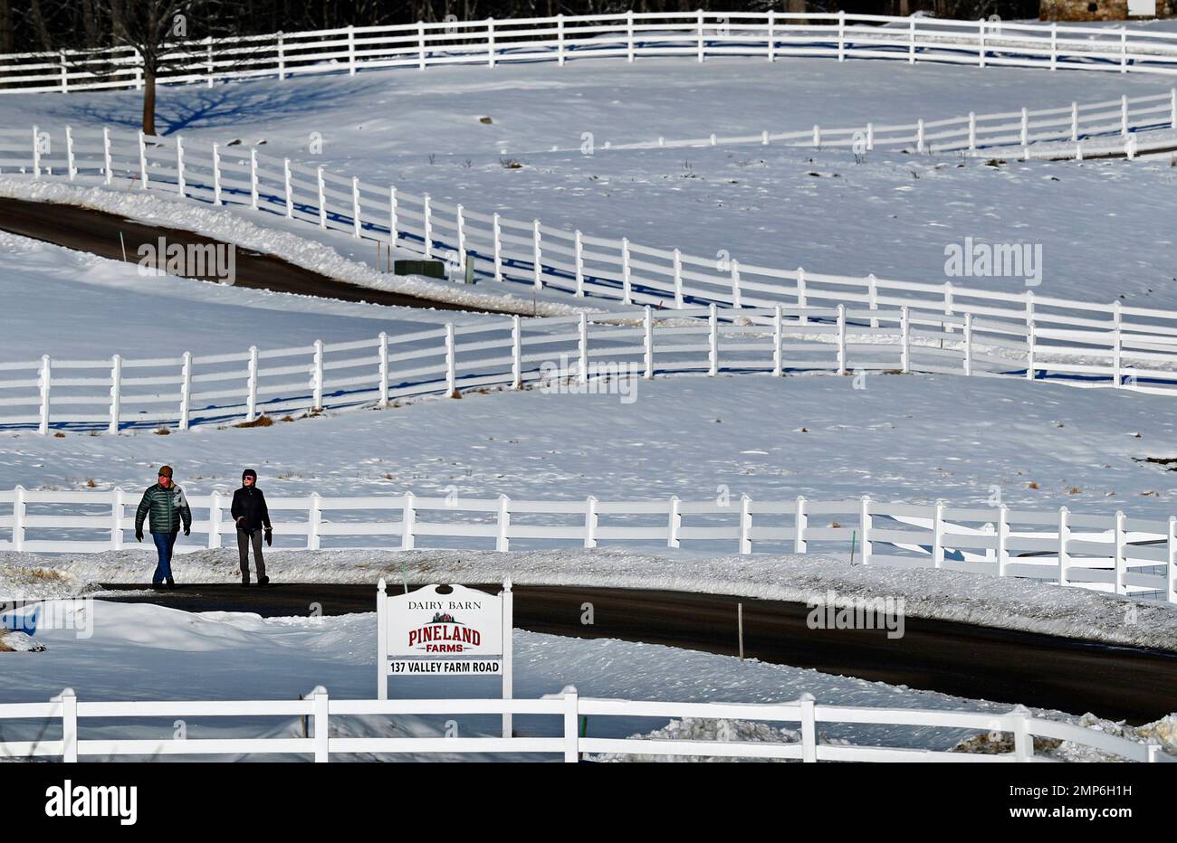 Brian Lanigan and his wife J.J. Lanigan, of Concord, Mass., stroll at ...