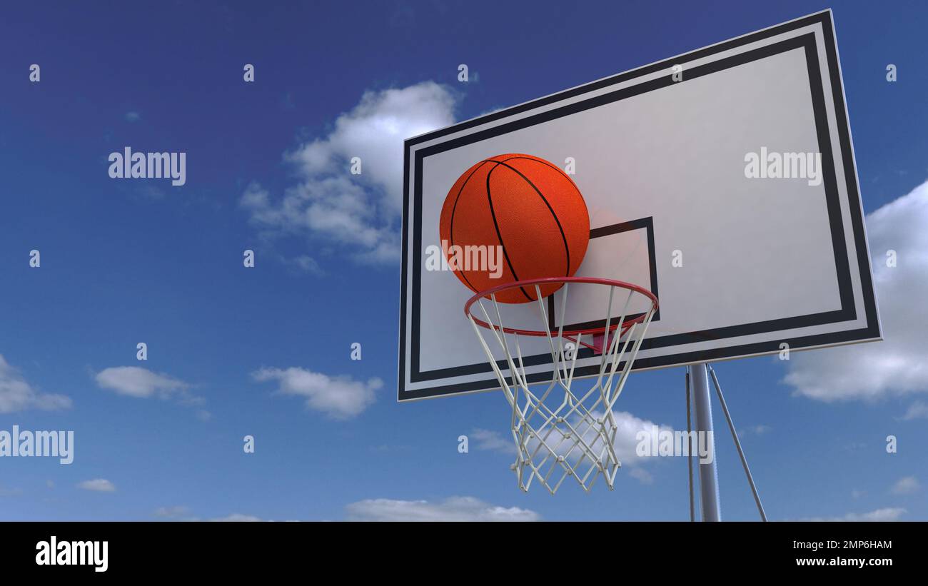 basketball ball hits the basketball net on the sky background 3D render ...