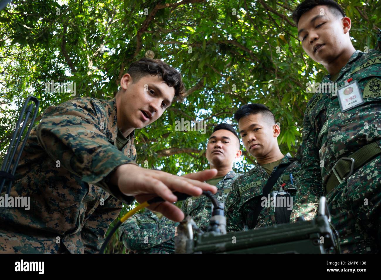 U.S. Marine Corps Cpl. Brandon Sells (left), a radio operator with 3d ...