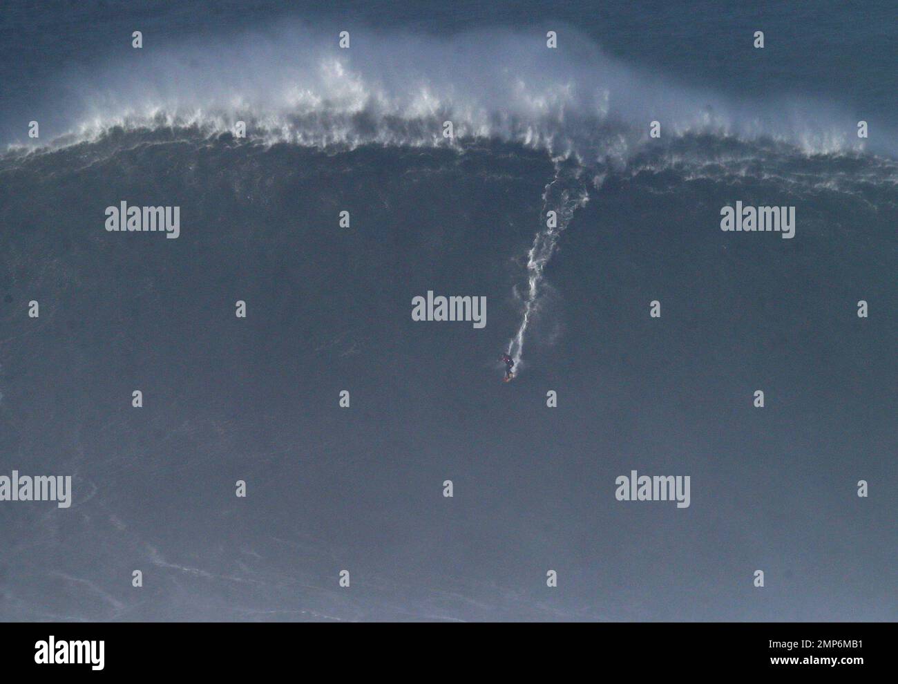 Australian surfer Ross Clarke-Jones rides a wave during a big wave ...
