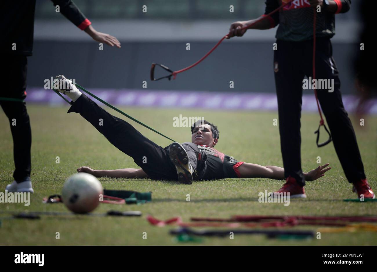 Bangladesh's Mohammad Saifuddin stretches during a training session ...