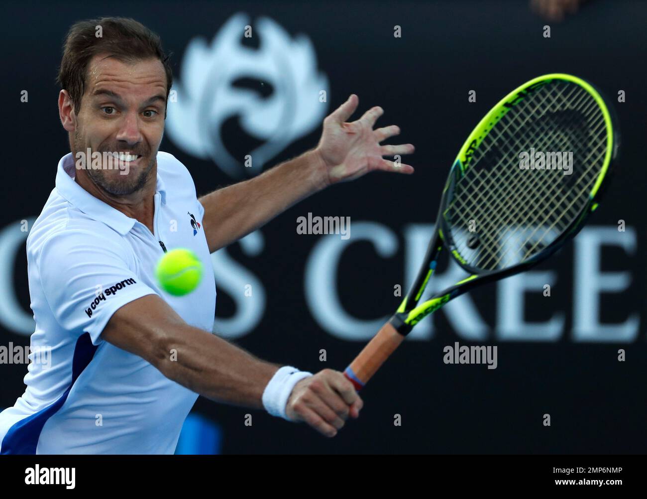 France's Richard Gasquet makes a backhand return to Italy's Lorenzo ...