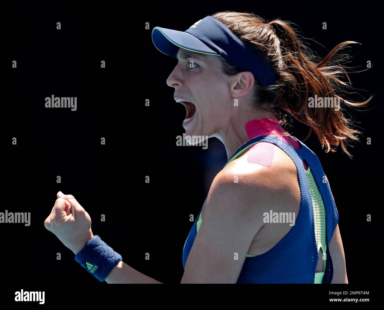 Germany's Andrea Petkovic clenches her fist while playing United States ...
