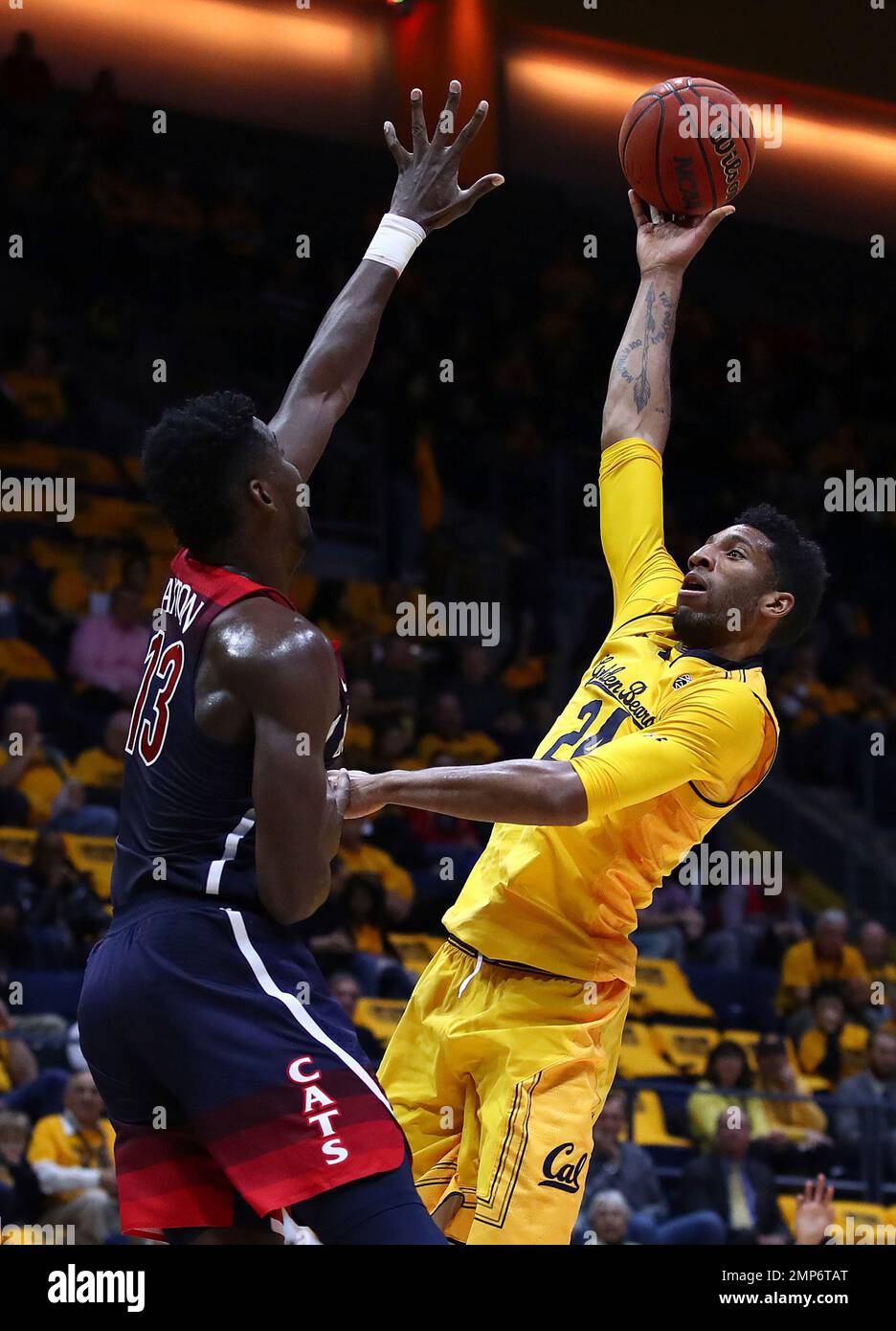 California's Marcus Lee, right, shoots over Arizona's Deandre Ayton (13 ...