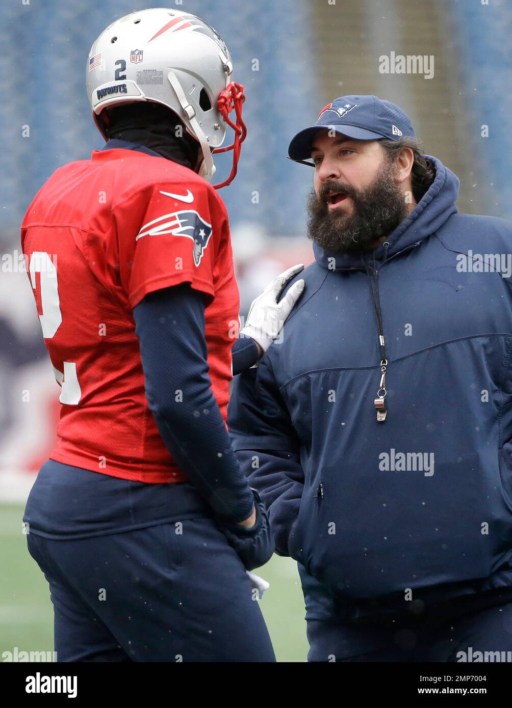 New England Patriots quarterback Brian Hoyer, left, speaks with ...