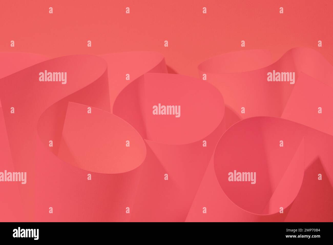 Background from rolls of paper. Origami. Art paper. Curves, shadows ...