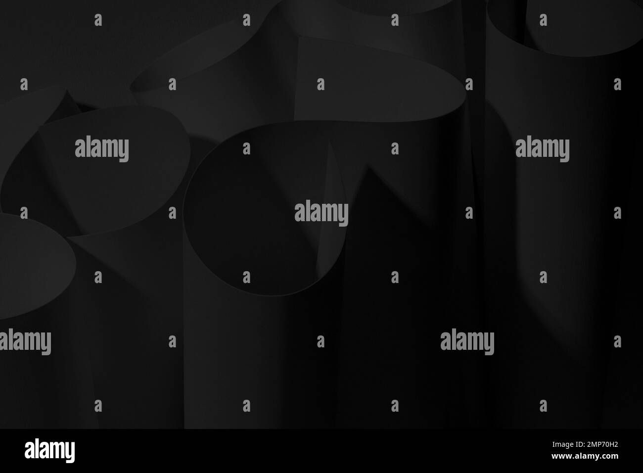 Background from rolls of paper. Origami. Art paper. Curves, shadows ...