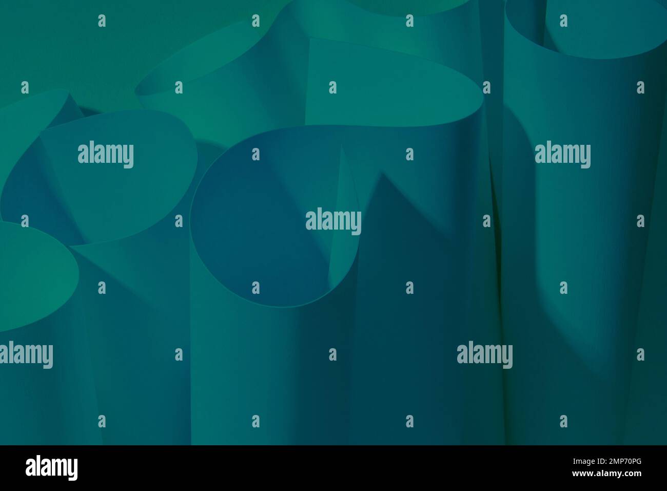 Background from rolls of paper. Origami. Art paper. Curves, shadows ...