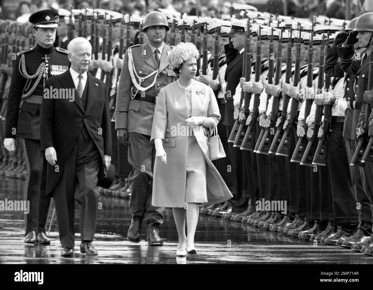 Queen Elizabeth II and President Heinrich Lubke of west Germany review ...