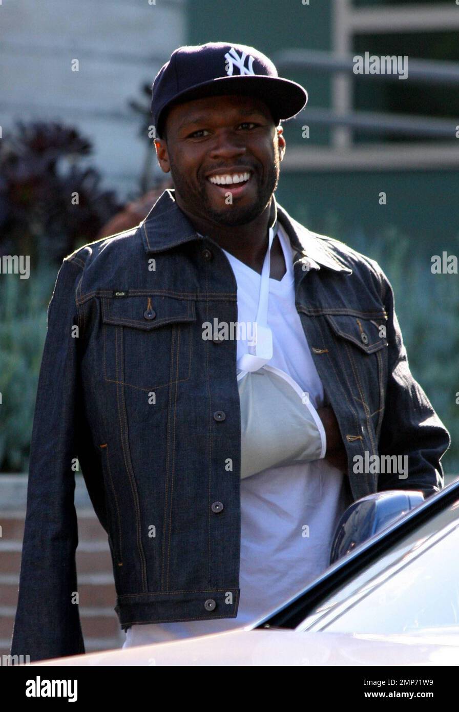 Rapper 50 Cent leaves the "Chelsea Lately" show studios with his arm in ...