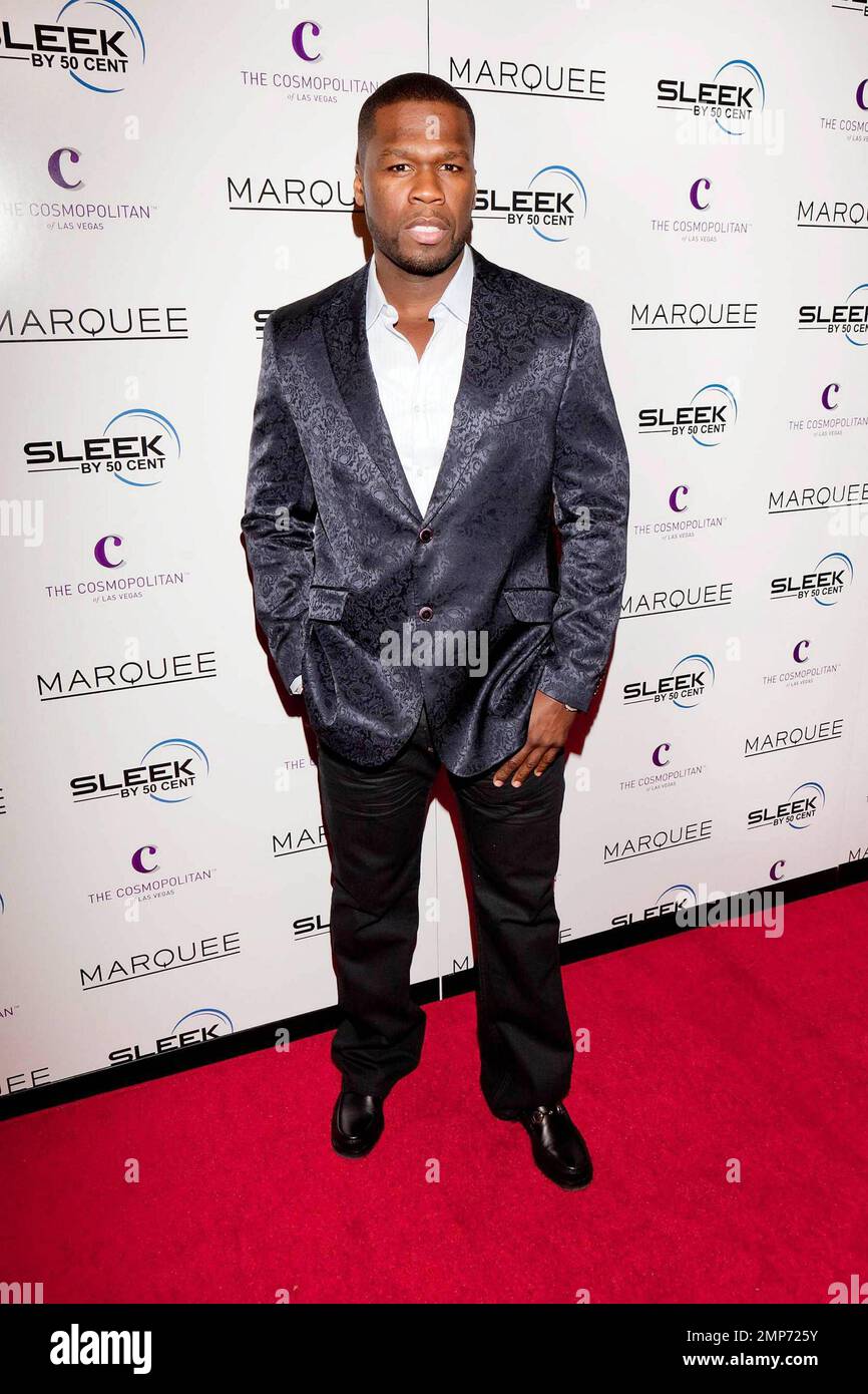 50 Cent (aka Curtis Jackson) wears a tailored paisley patterned jacket ...