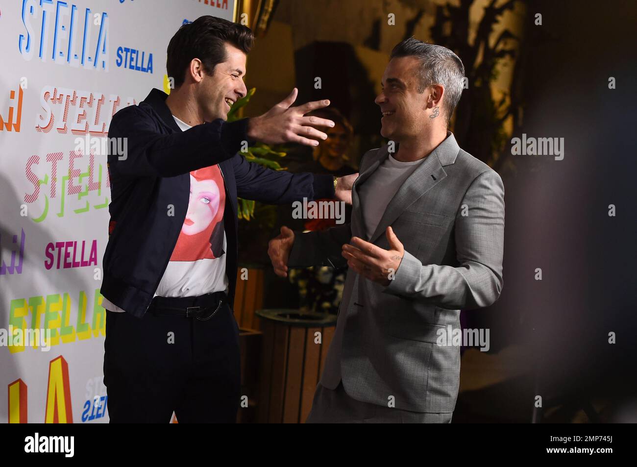 Mark Ronson and Robbie Williams arrive at the Stella McCartney Autumn ...