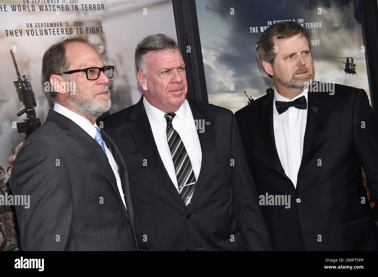 Retired Major Mark Nutsch, left, Lieutenant General John F. Mulholland ...