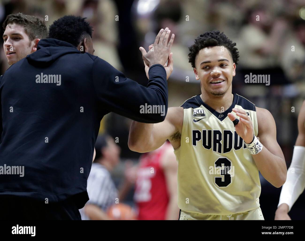Purdue guard Carsen Edwards (3) celebrates as he comes off the floor ...