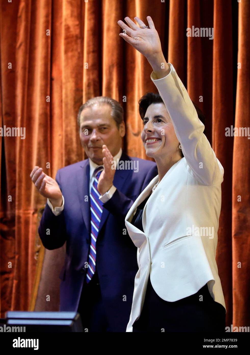 Rhode Island Democratic Gov. Gina Raimondo, right, waves as Democratic ...