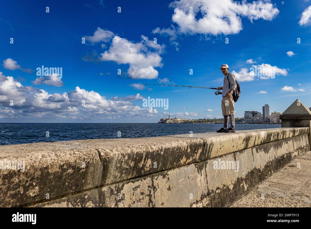 Cuban fishing on sea wall, Malecon, Vedado, Havana, Cuba Stock Photo ...