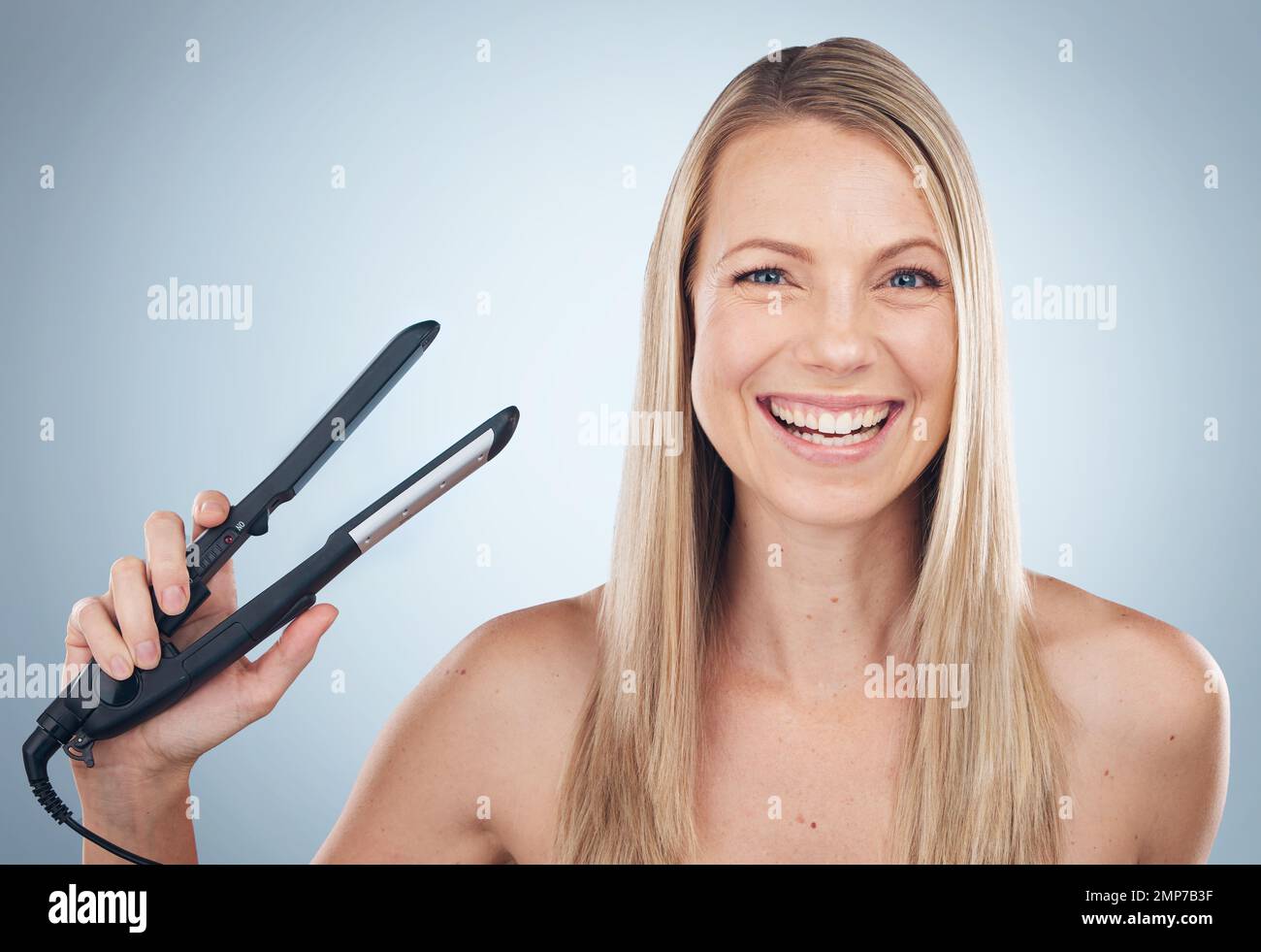 Face portrait, hair straightener and beauty of woman in studio isolated ...