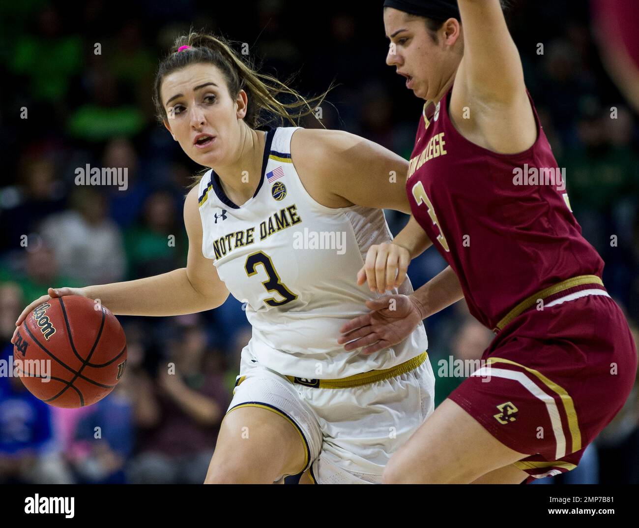 Notre Dame's Marina Mabrey, left, gets pressure from Boston College's ...