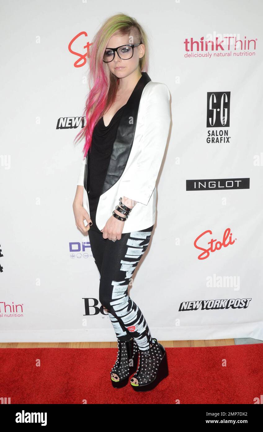 Avril Lavigne shows off her engagement ring at the Style 360 Abbey Dawn ...