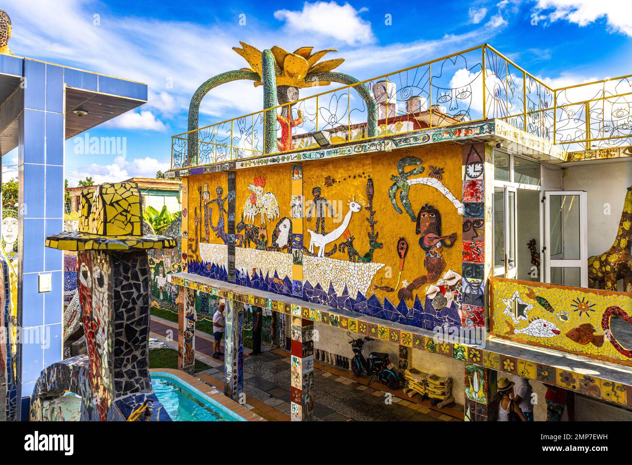 Tiled mosaic walls and sculptures on upper levels of workshop studio of ...