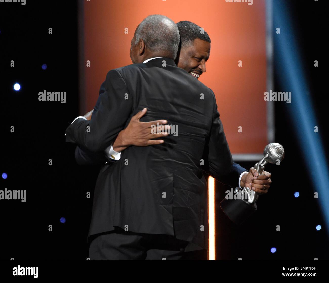 Derrick Johnson, NAACP president and CEO, left, congratulates Danny ...