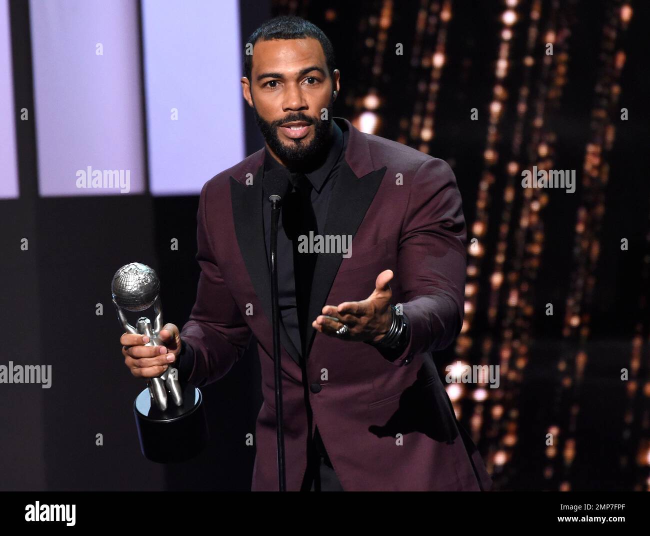 Omari Hardwick accepts the award for outstanding actor in a drama ...